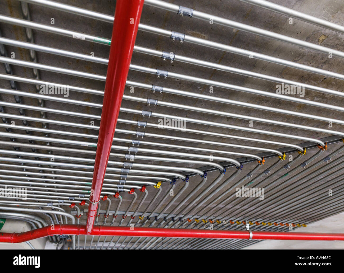 Conduits mounted on ceiling Stock Photo - Alamy