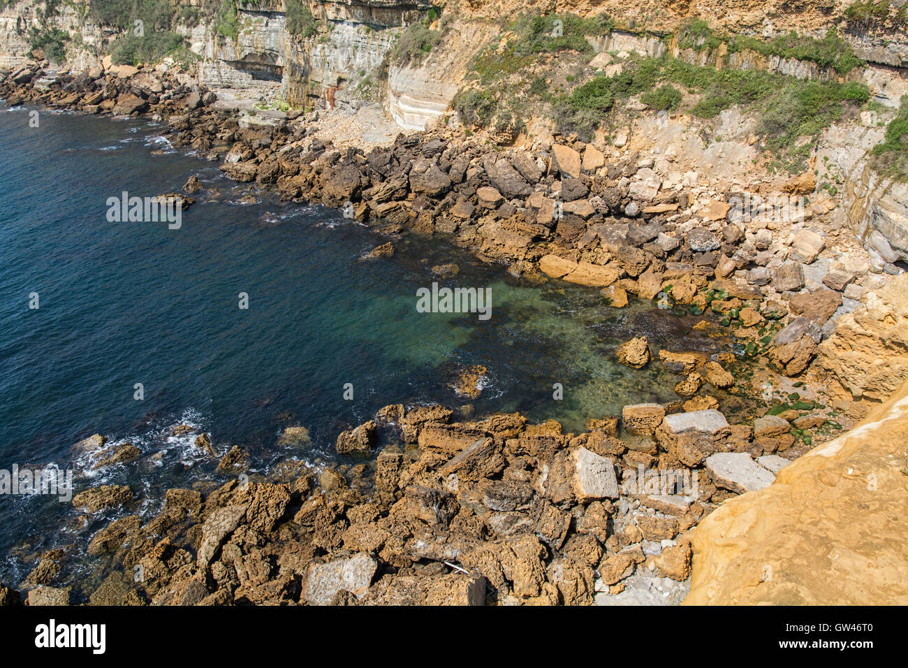 litle rocky bay with calm sea in sunny summer day Stock Photo - Alamy