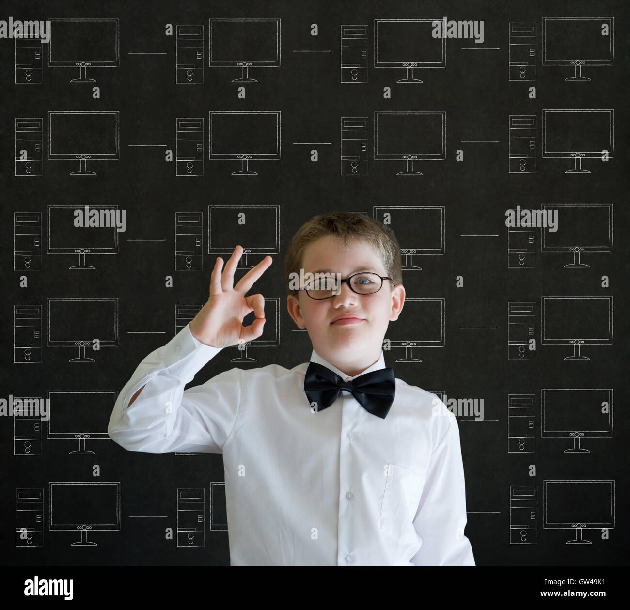 Ok hand signal boy with chalk networks on blackboard background Stock ...