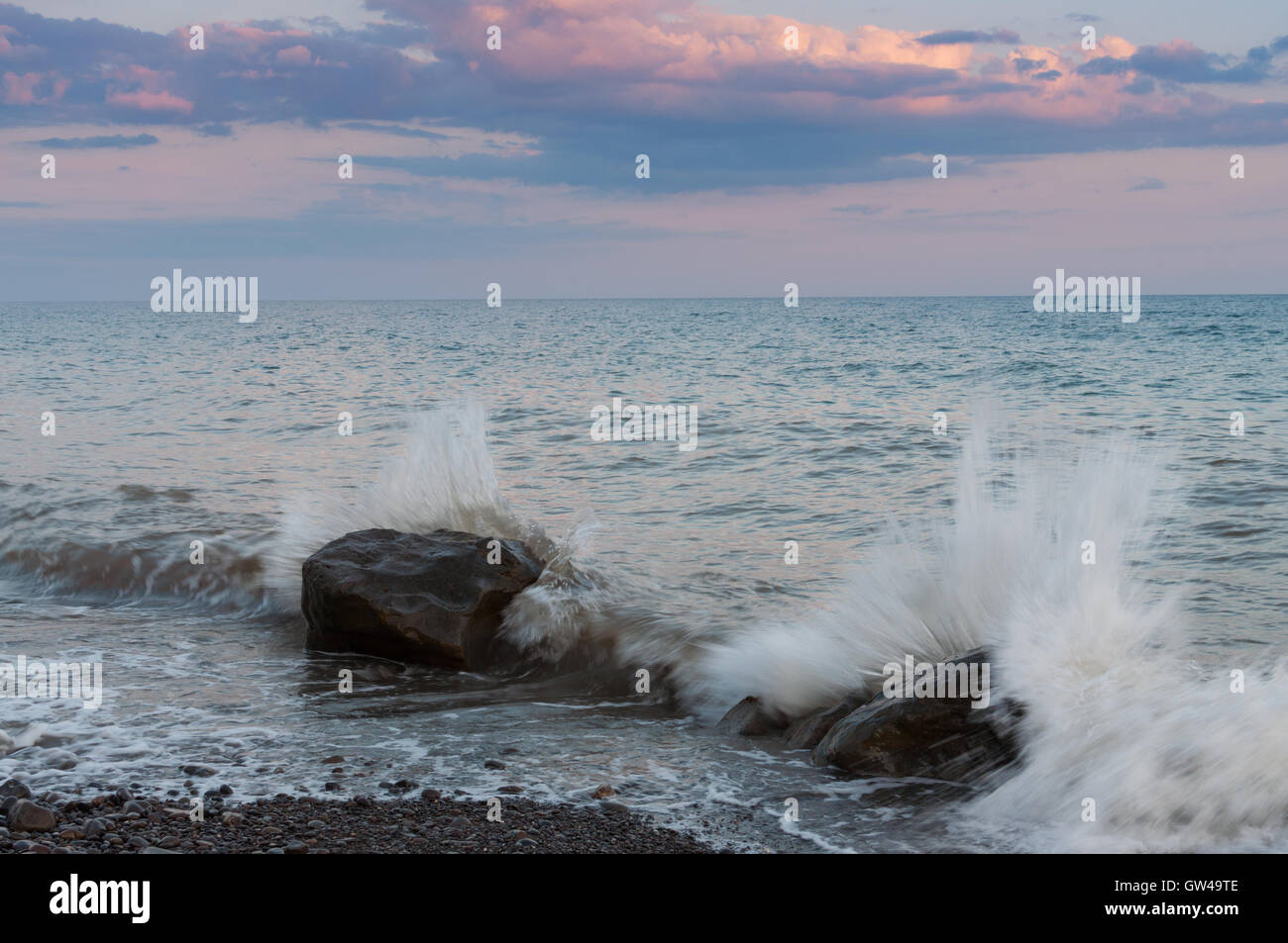 Waves breaking on coastal rocks Stock Photo - Alamy