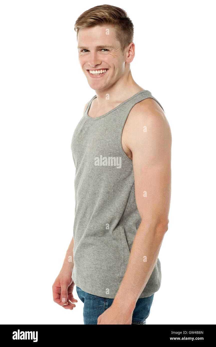 Happy smart young guy Stock Photo - Alamy