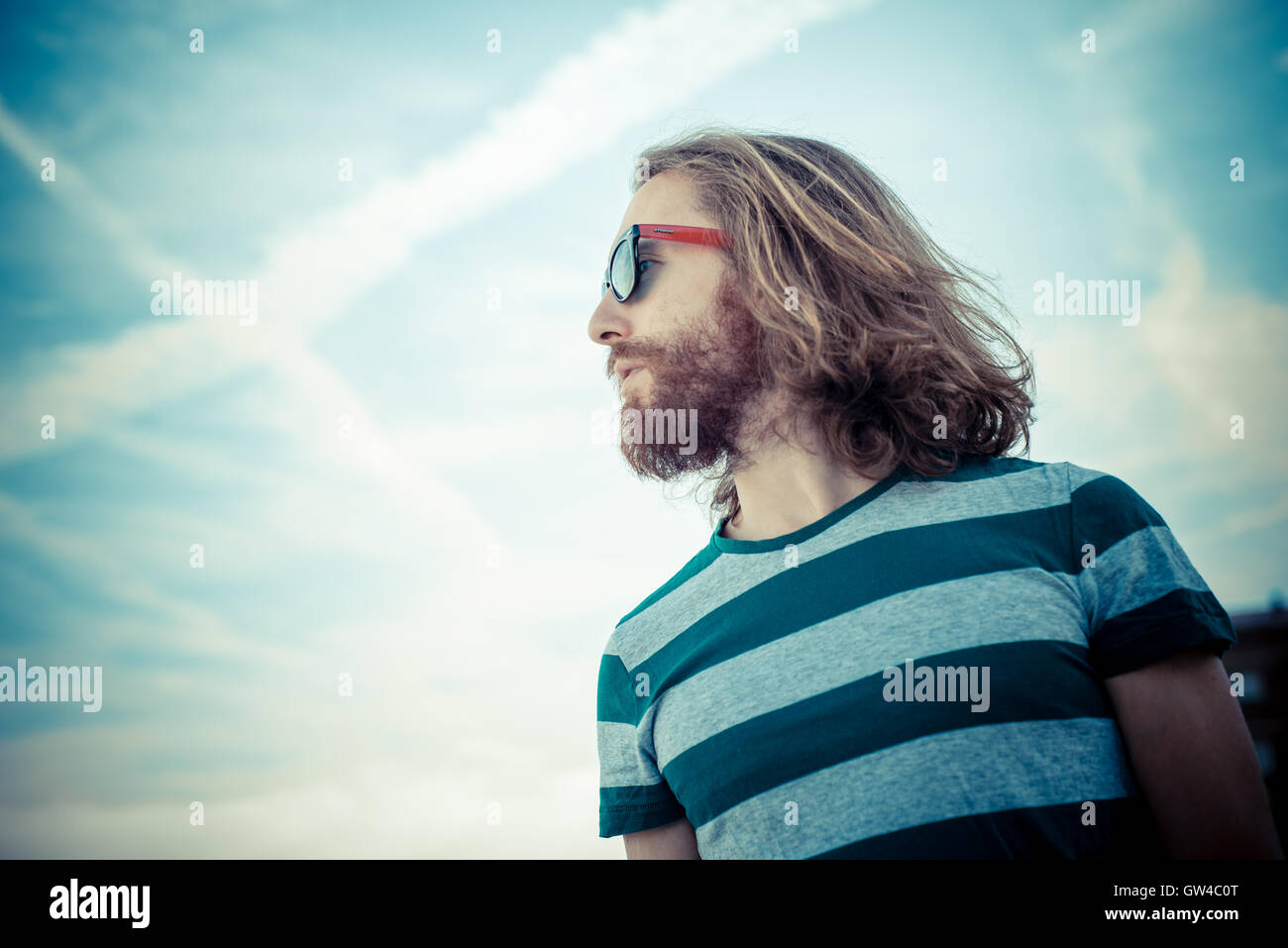 stylish hipster model with long red hair and beard lifestyle Stock ...
