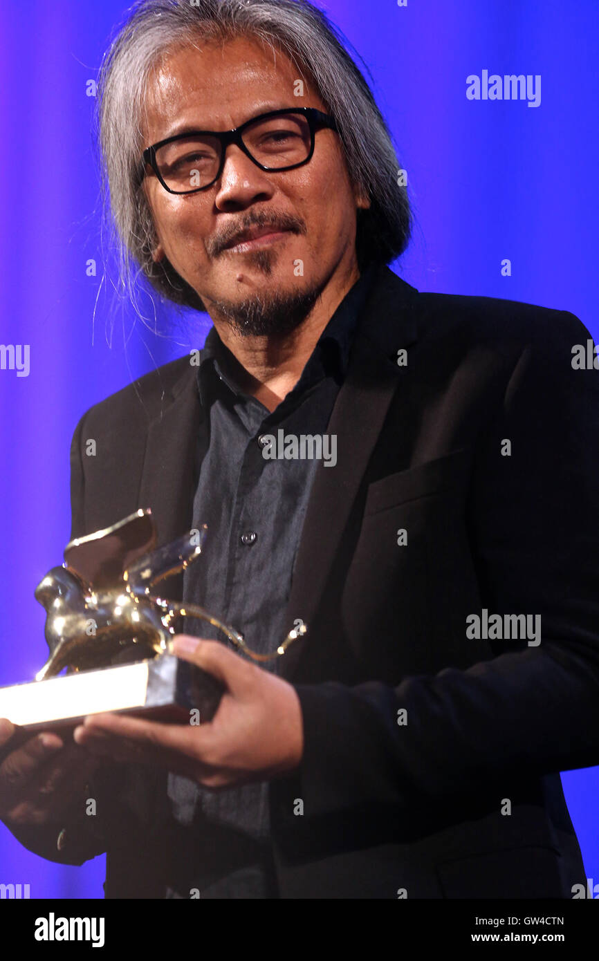 Venice, Italy. 10th Sep, 2016. Director Lav Diaz holds the Golden Lion ...