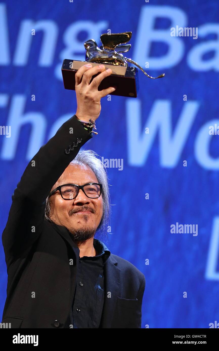 Venice, Italy. 10th Sep, 2016. Director Lav Diaz holds the Golden Lion ...