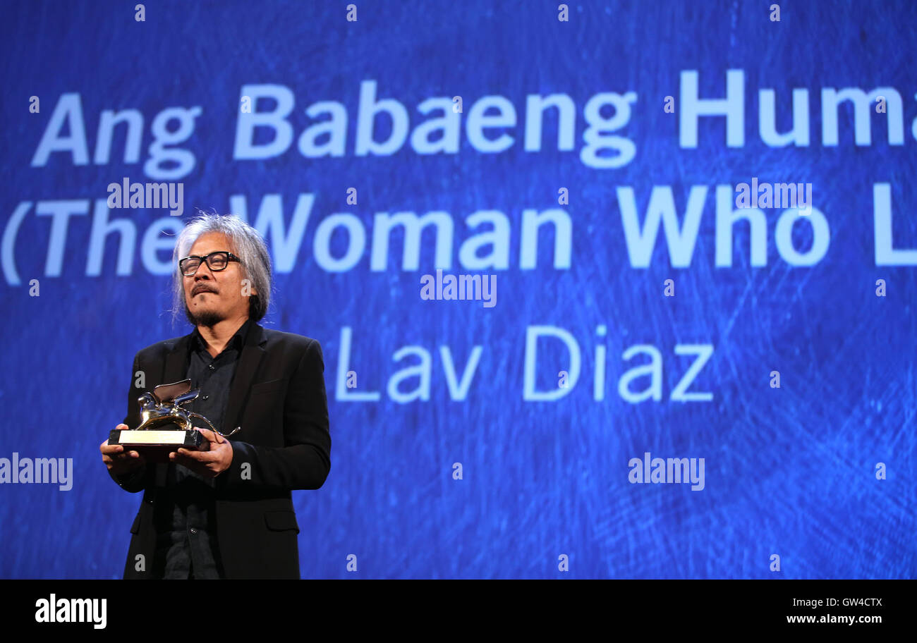 Venice, Italy. 10th Sep, 2016. Director Lav Diaz holds the Golden Lion ...
