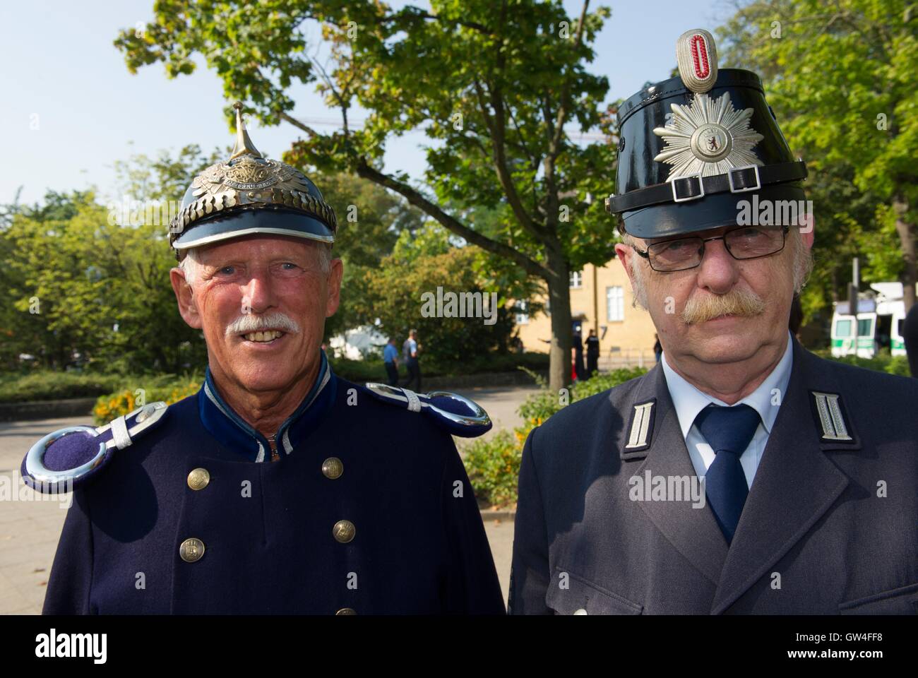 Berlin, Germany. 11th Sep, 2016. Two policemen presenting historical ...