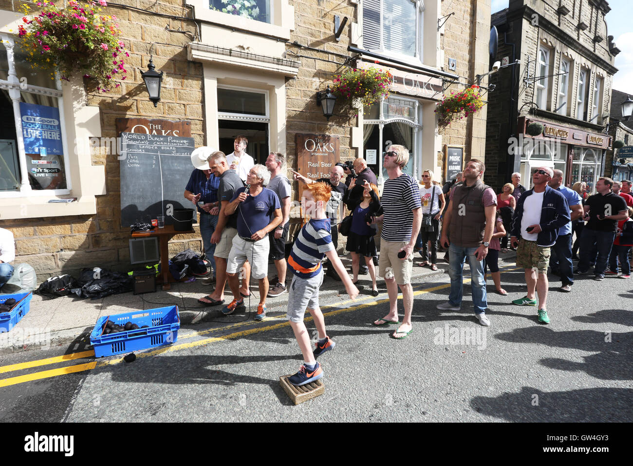 Ramsbottom, UK. 11th September, 2016. A young lad putting his effort ...