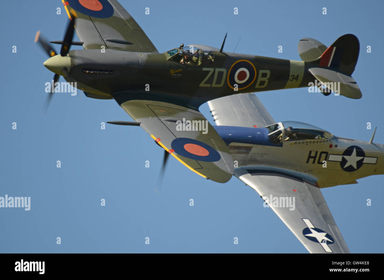 Spitfire and P-51 Mustang pair flying at the Goodwood Revival Stock ...