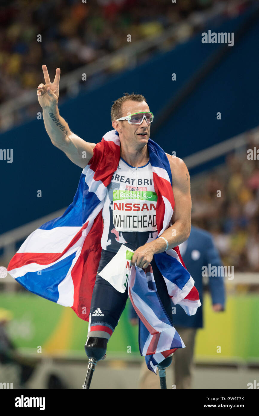 Great Britain's Richard Whitehead exults after winning the men's 200 ...