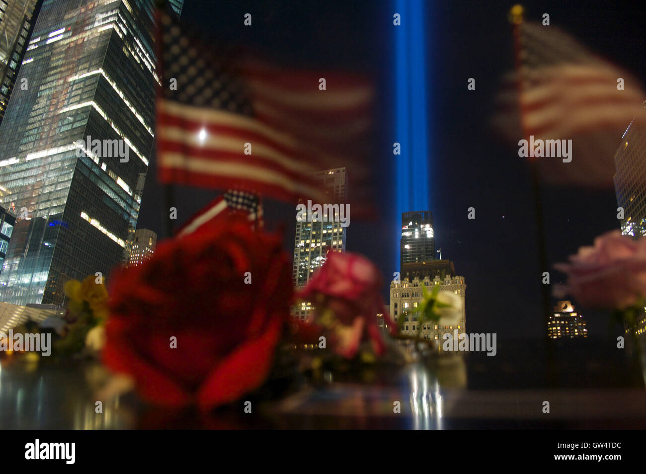 9 11 memorial with flowers and flags hi-res stock photography and ...