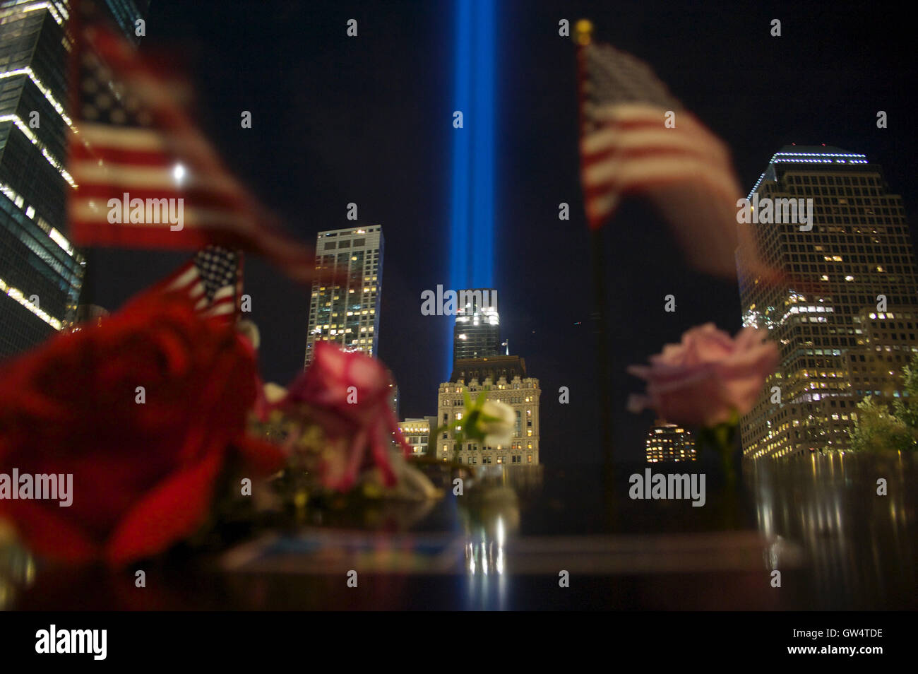 9 11 memorial with flowers and flags hi-res stock photography and ...