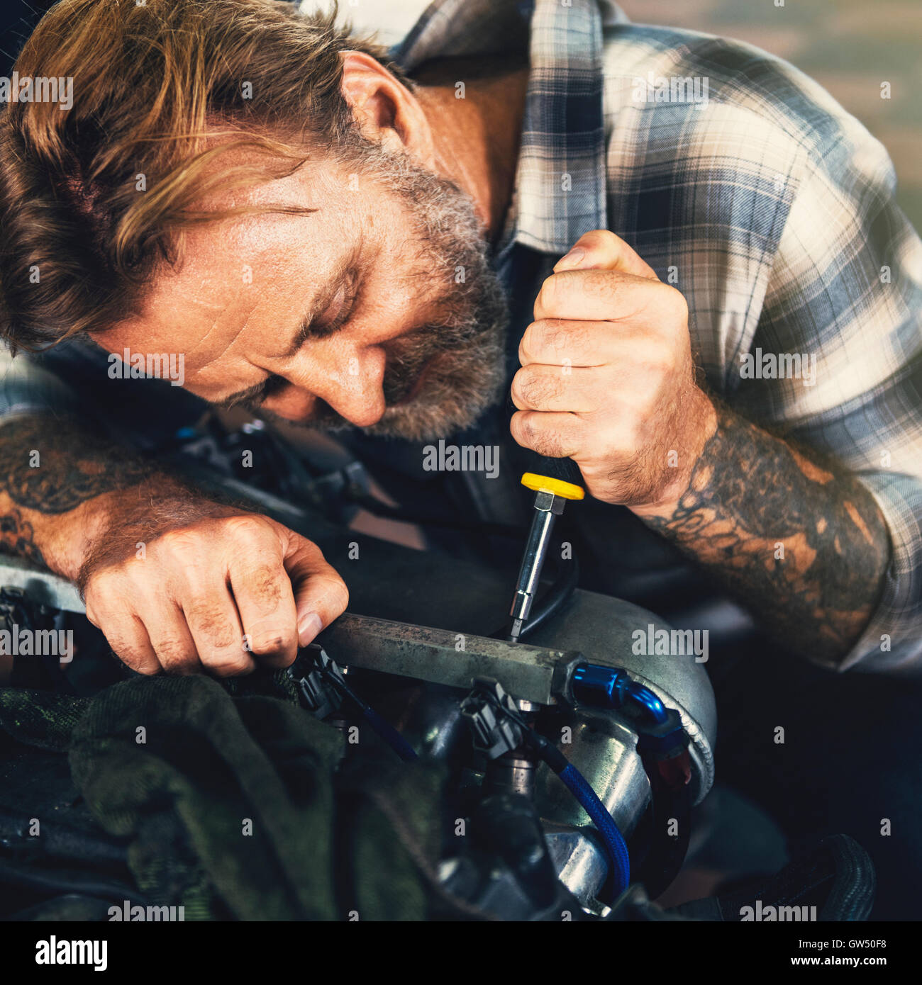 Mechanic Screwdriver Fixing Garage Concept Stock Photo - Alamy