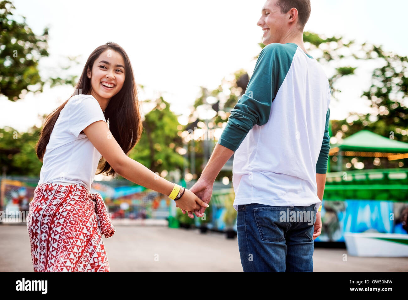 Young Couple Date Holding Hands Concept Stock Photo - Alamy
