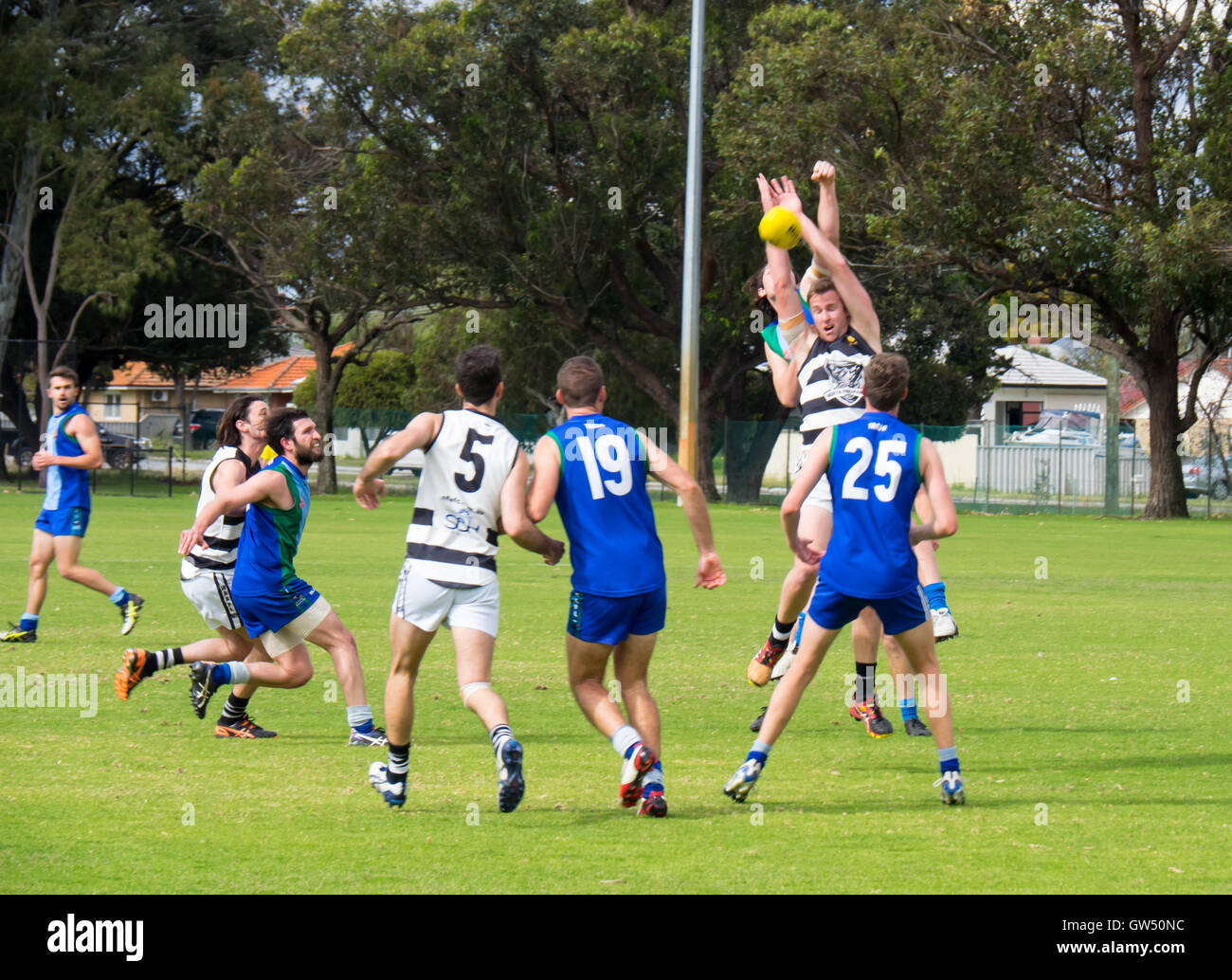 Australian rules football marking hi-res stock photography and images ...