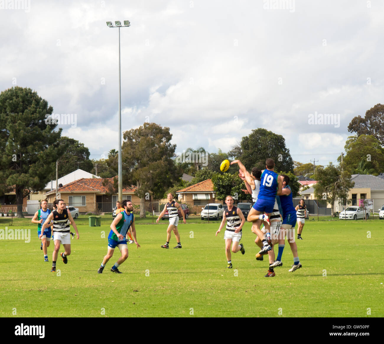 Australian rules football marking hi-res stock photography and images ...