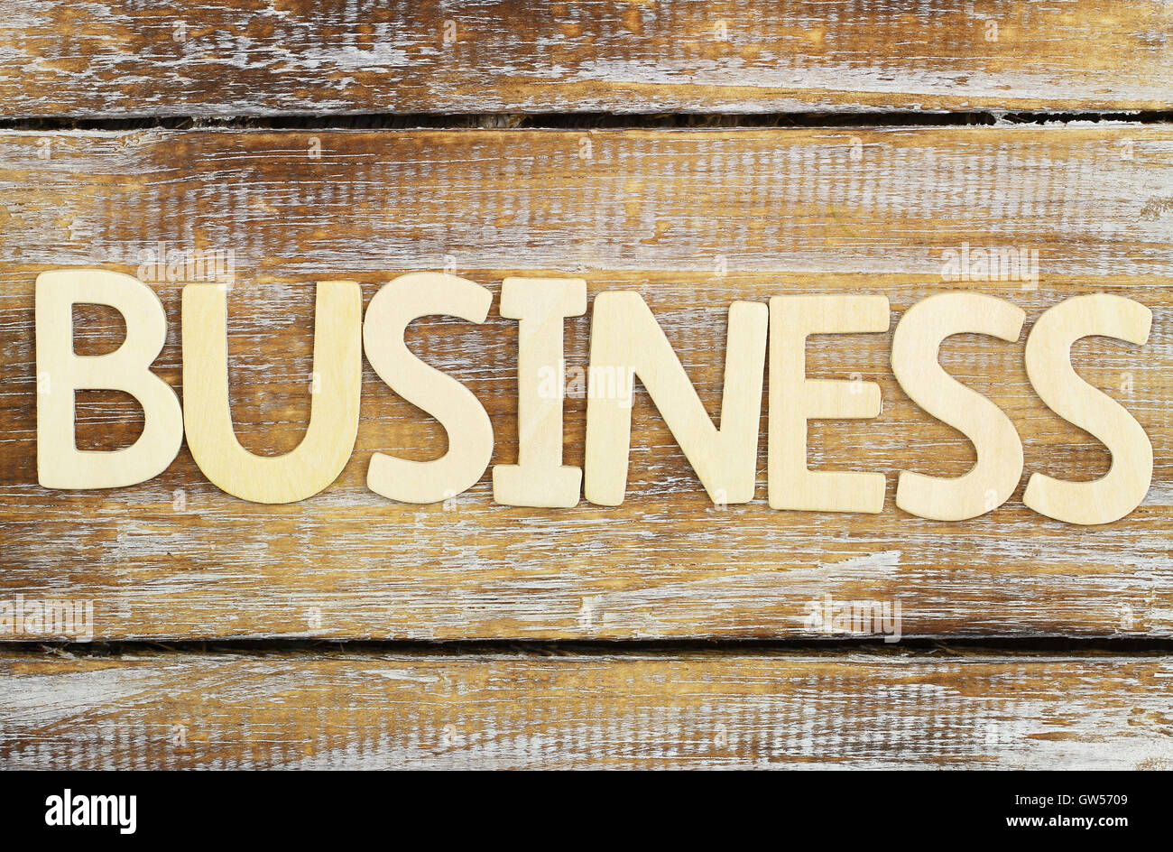 Word business written with letters on wooden surface Stock Photo - Alamy