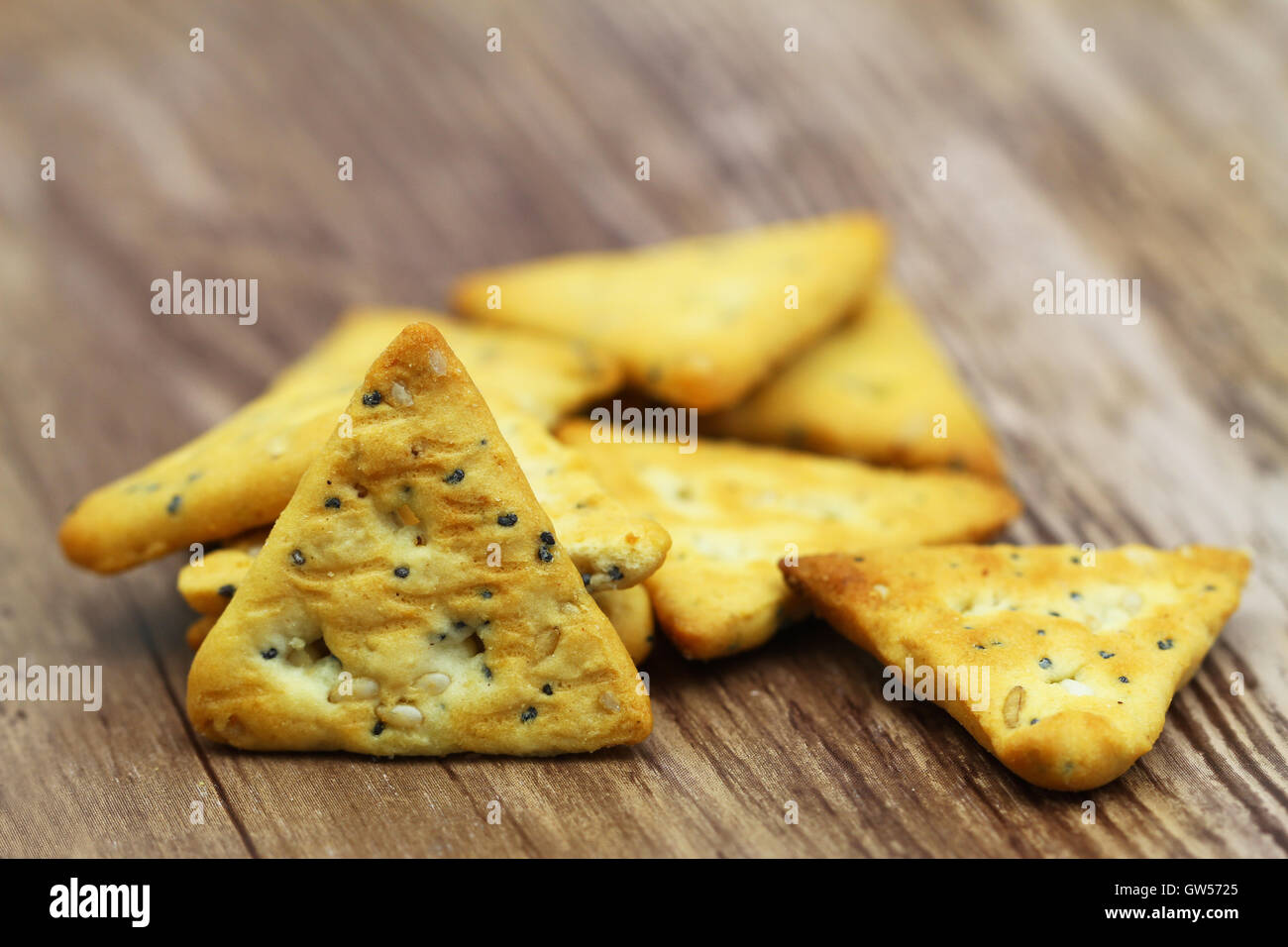 Crunchy poppy seed and sesame seeds snacks, closeup Stock Photo - Alamy
