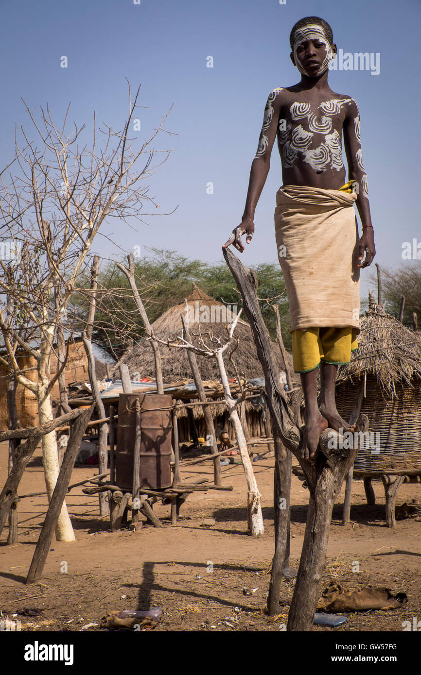 Young boy of the Karo tribe in the Omo Valley of Ethiopia proudly ...