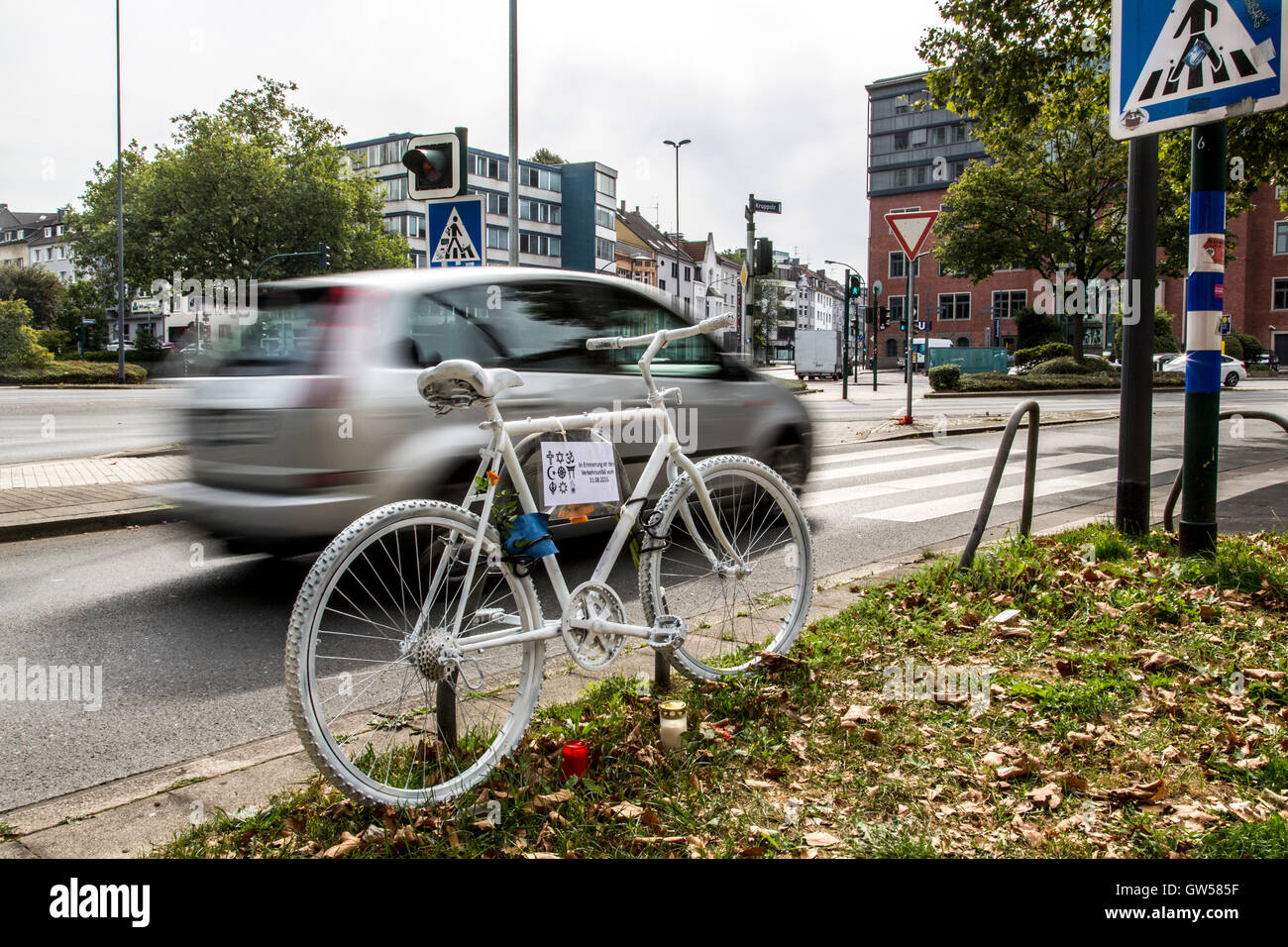 Ghost Bike, white painted bicycle as a memorial at an accident sit ...