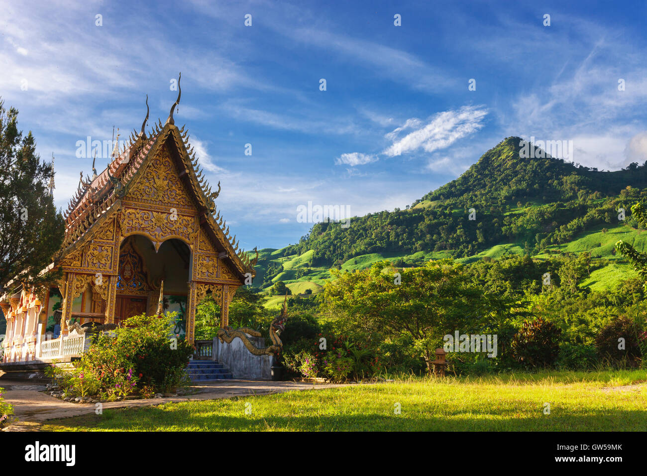 Temple in Thailand near mountain valley during sunrise. Natural summer ...