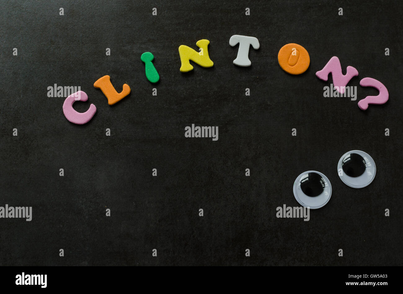 The name Clinton spelled out in colorful letters black background with ...
