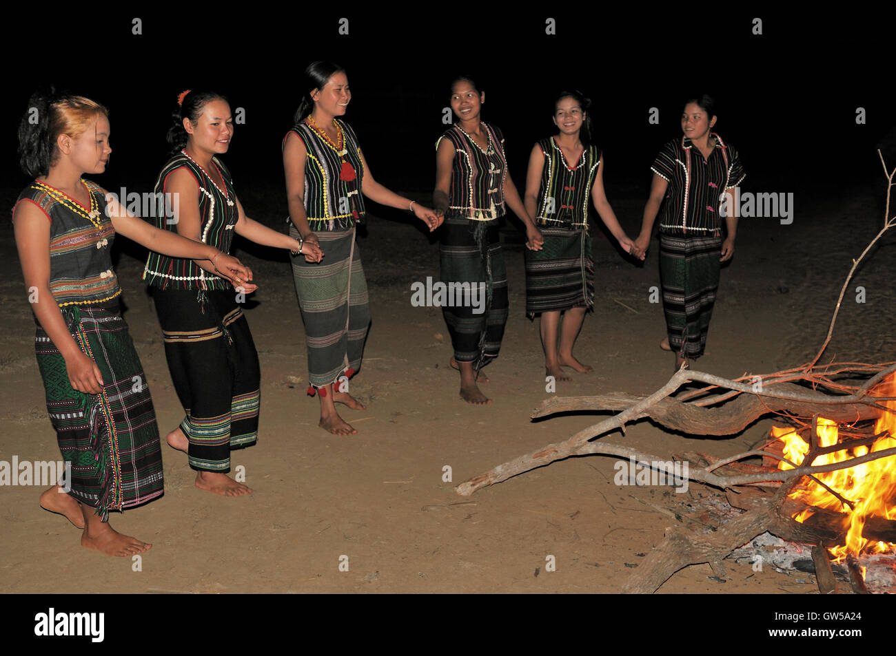 Phnong Village - celebration in traditional clothes, drinking rice wine ...