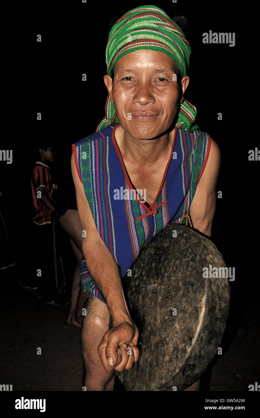 Phnong Village - celebration in traditional clothes, drinking rice wine ...