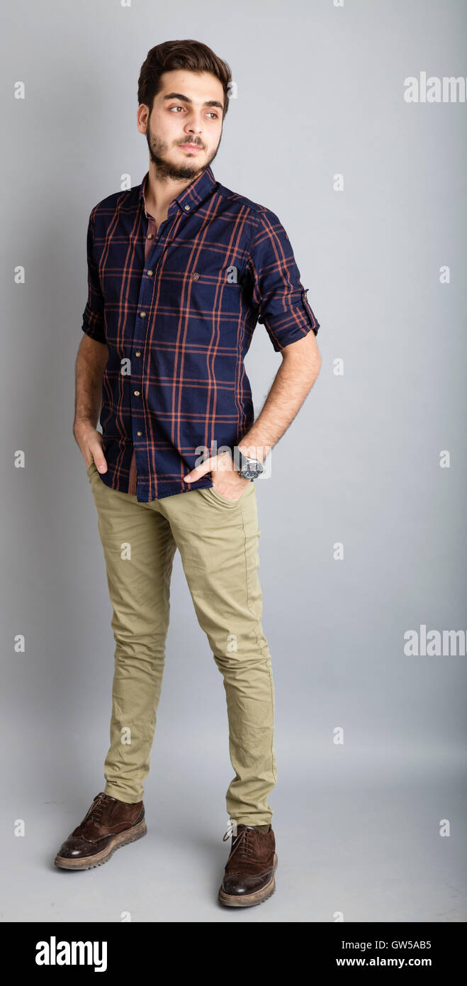 Caucasian Old boy isolated on grey background inside studio Stock Photo ...