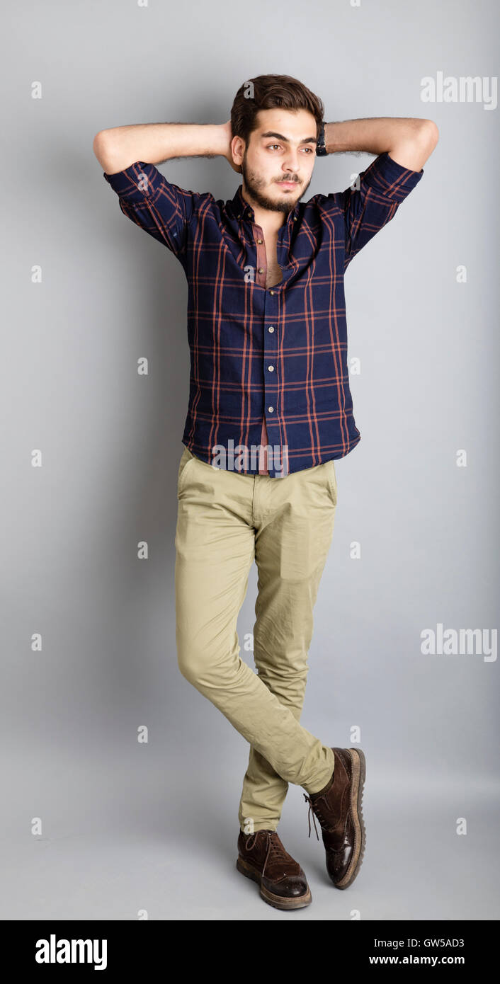 Caucasian Old boy isolated on grey background inside studio Stock Photo ...