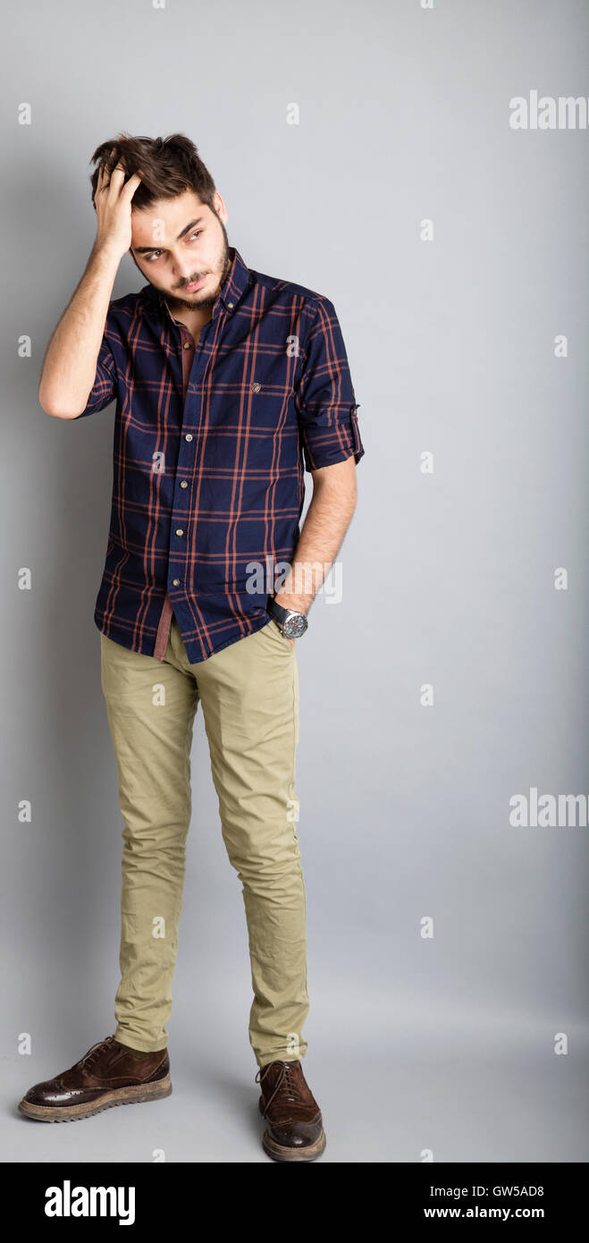 Caucasian Old boy isolated on grey background inside studio Stock Photo ...