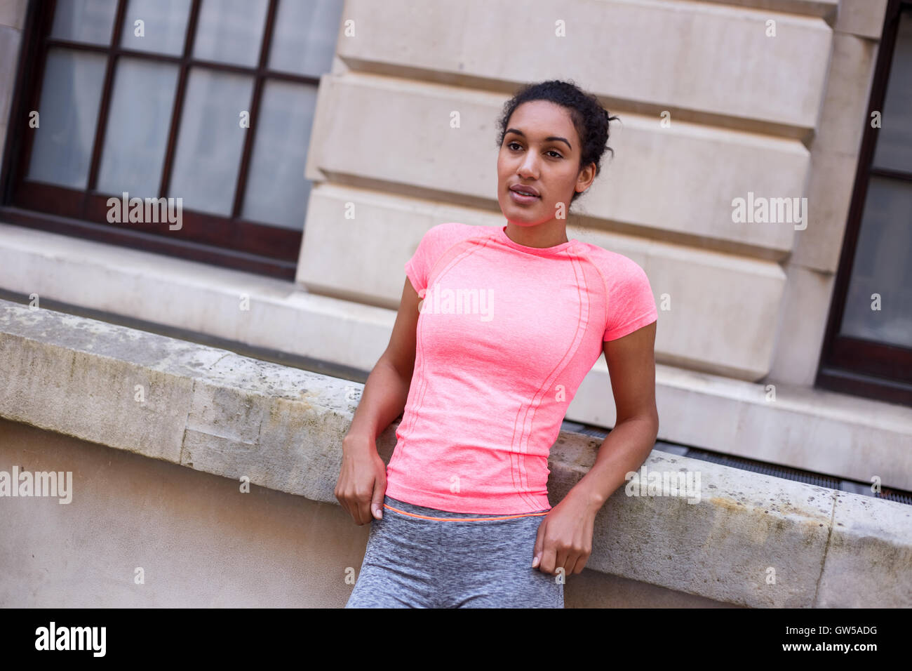 young woman relaxing before her workout Stock Photo - Alamy