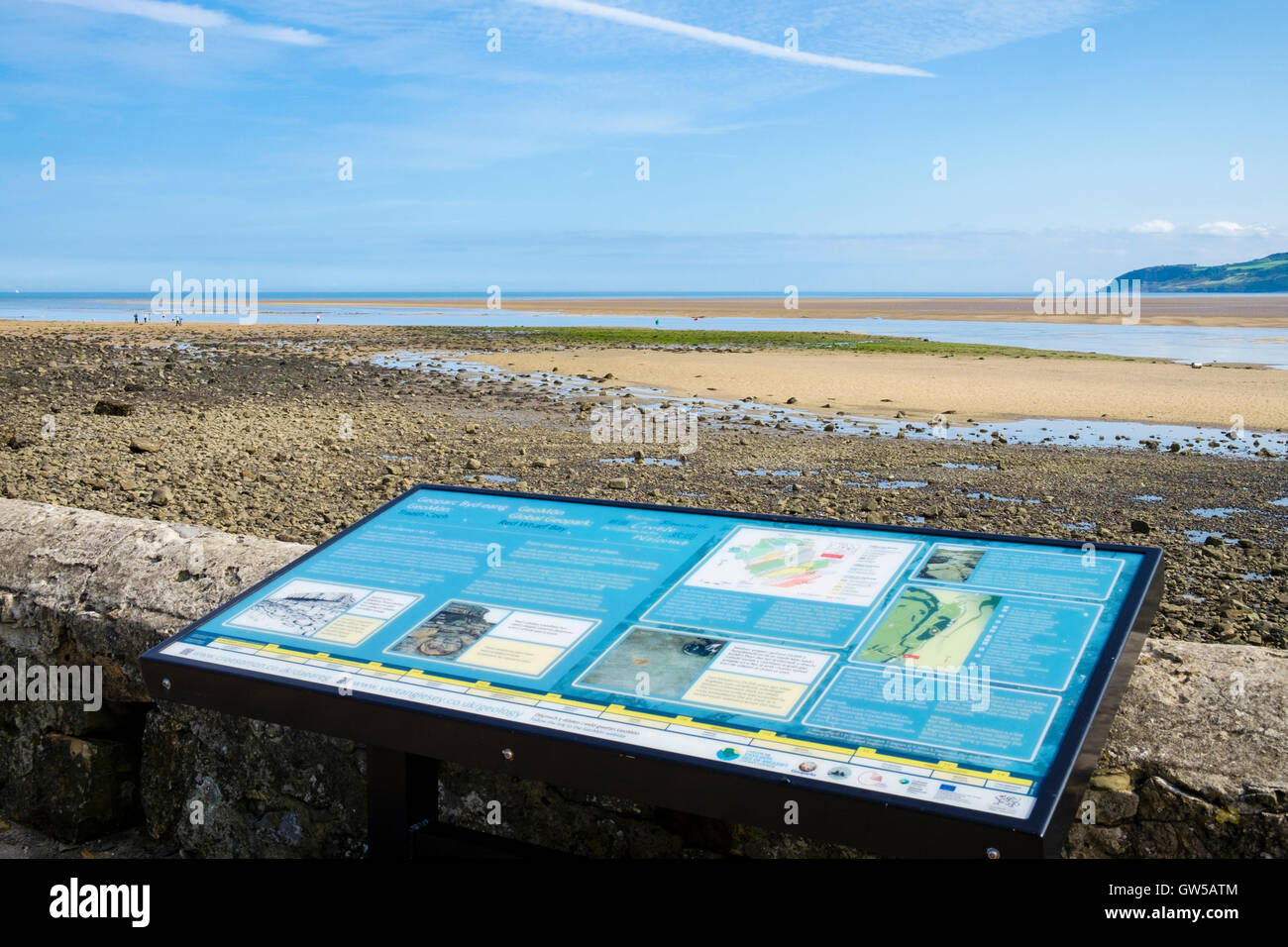 Bilingual information sign about GeoMon Global Geopark overlooking the ...