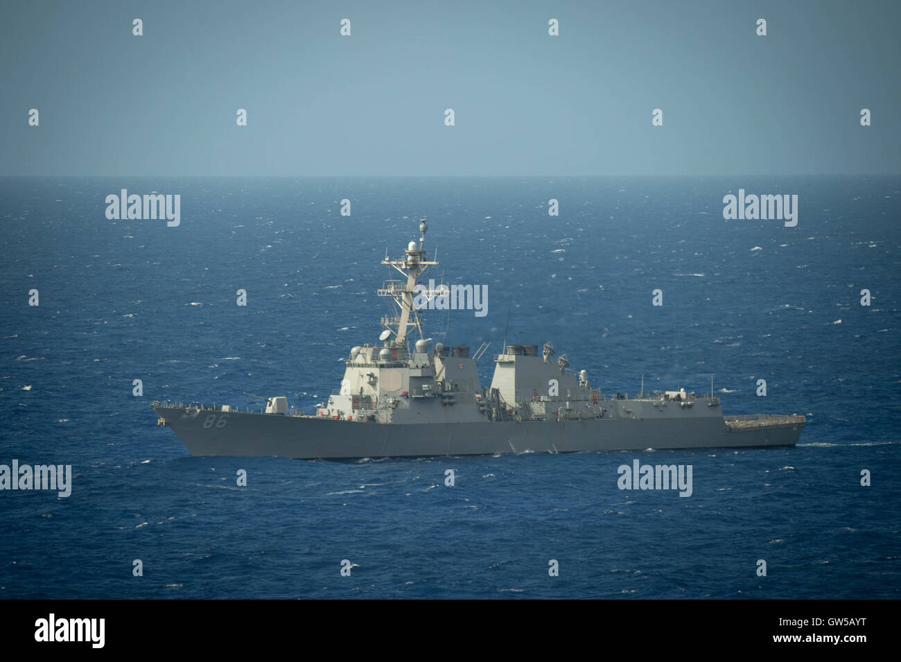 US Navy Arleigh Burke-class guided-missile destroyer USS Shoup steams ...