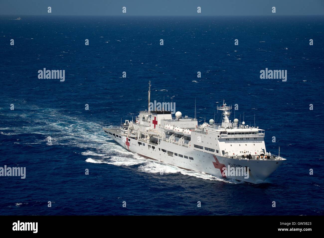 Chinese Navy hospital ship Peace Ark steams in close formation during ...