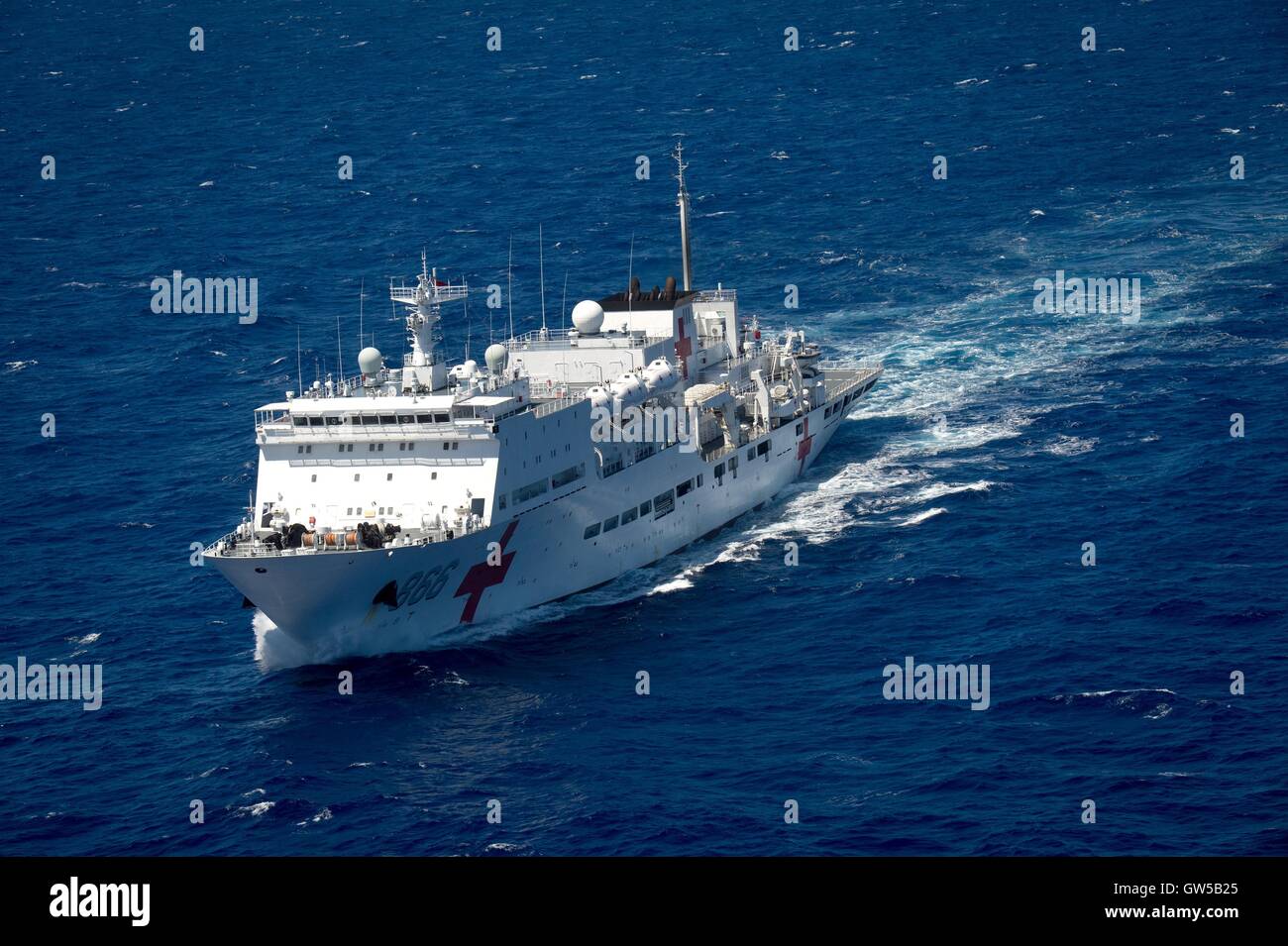 Chinese Navy hospital ship Peace Ark steams in close formation during ...