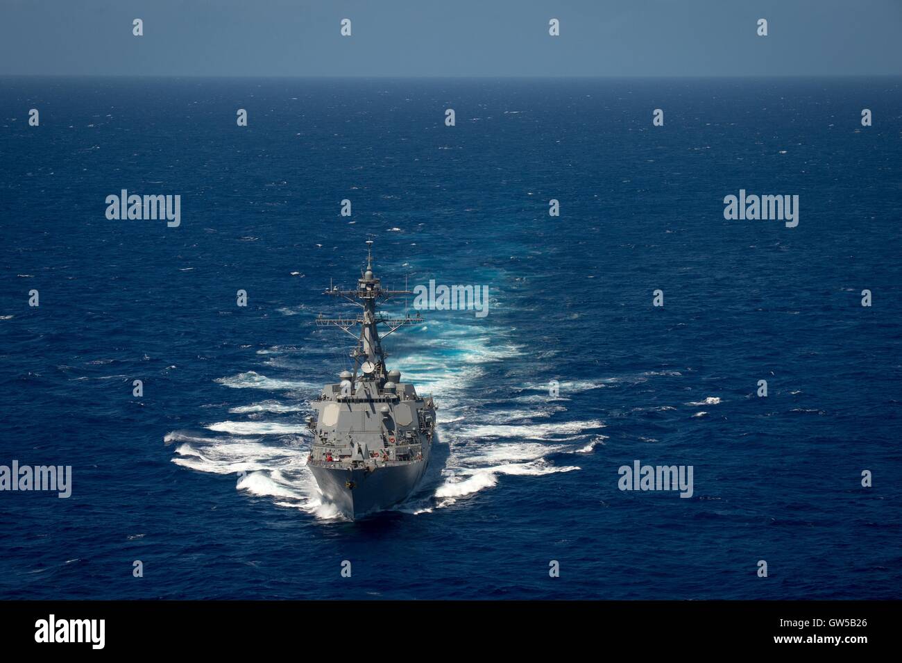 US Navy Guided-missile destroyer USS Stockdale steams in close ...