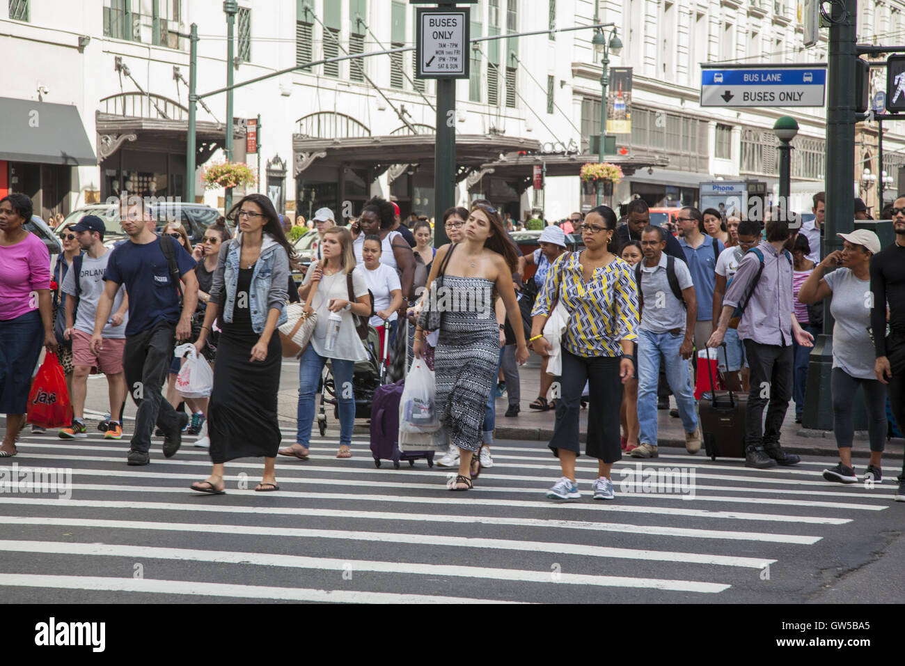 Shoppers along 34th Street across from Macy's Department Store in ...