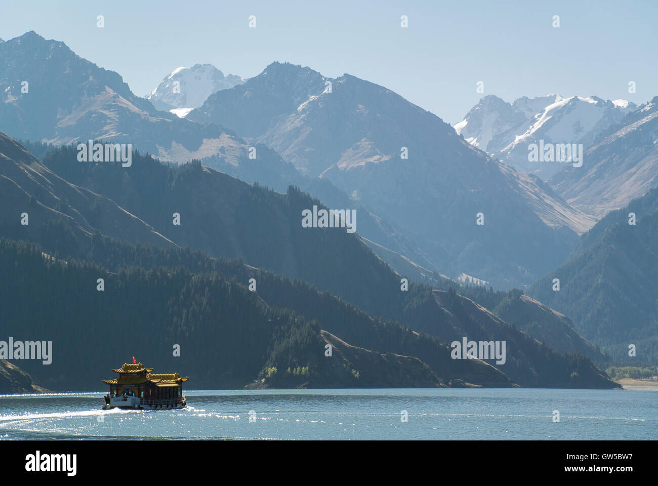 Boat on Heavenly Lake (Tianchi) near Urumqi, China Stock Photo - Alamy