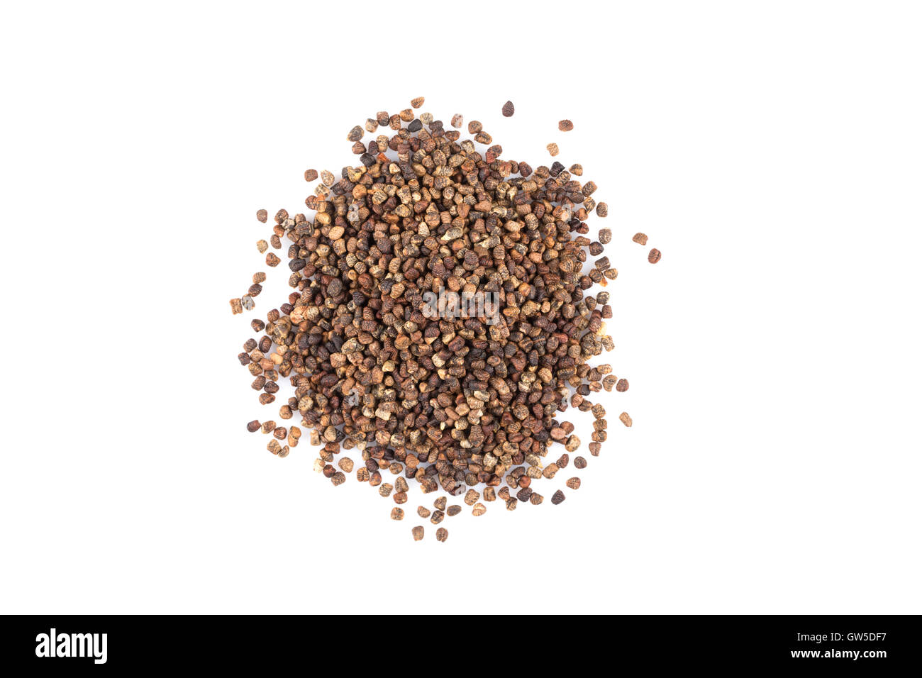 Decorticated cardamom seeds pile on a white background Stock Photo - Alamy