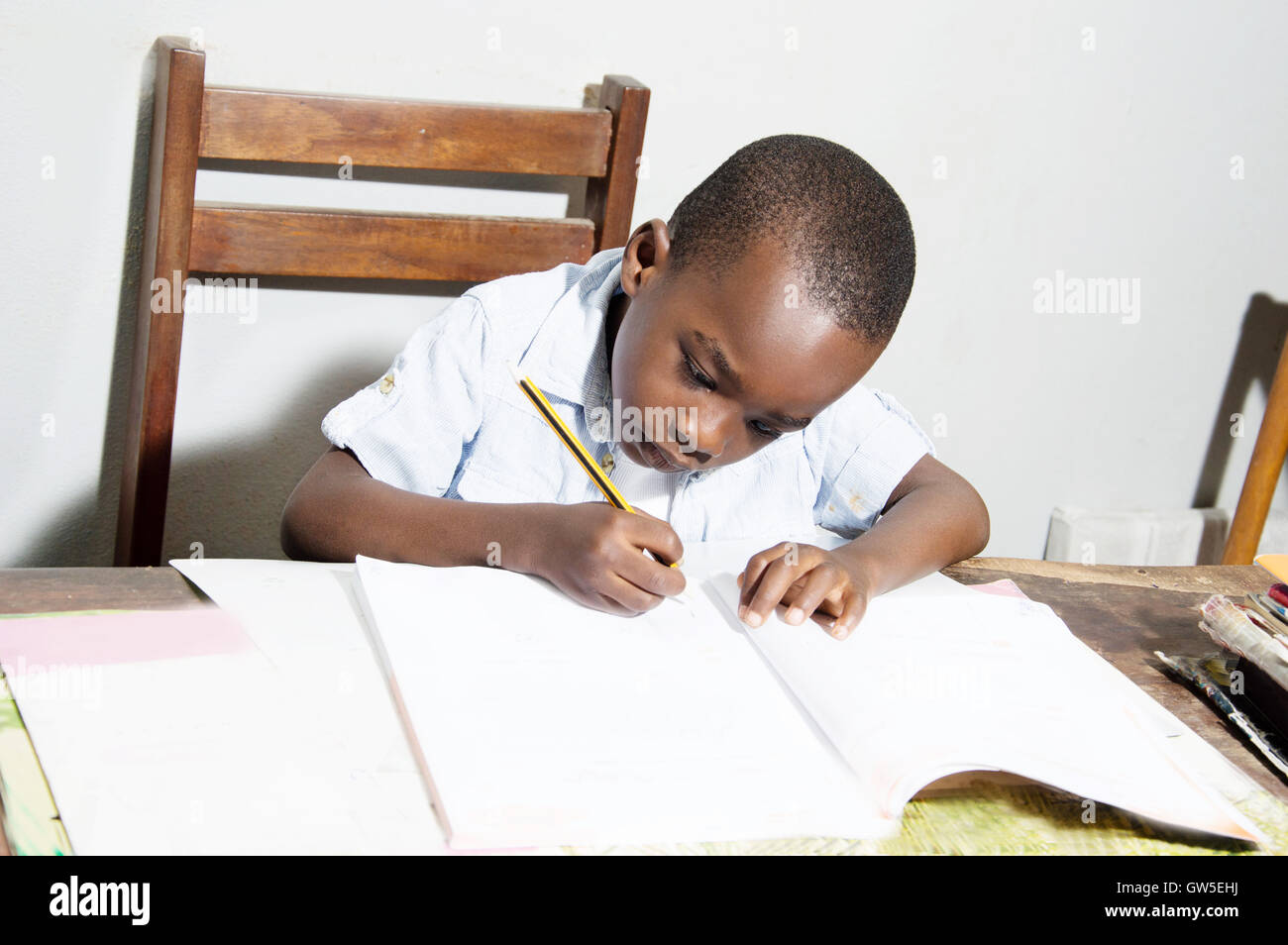 African school child in school writing hi-res stock photography and ...