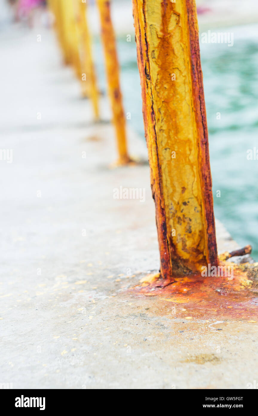 Yellow colored rusty metal construction Stock Photo - Alamy