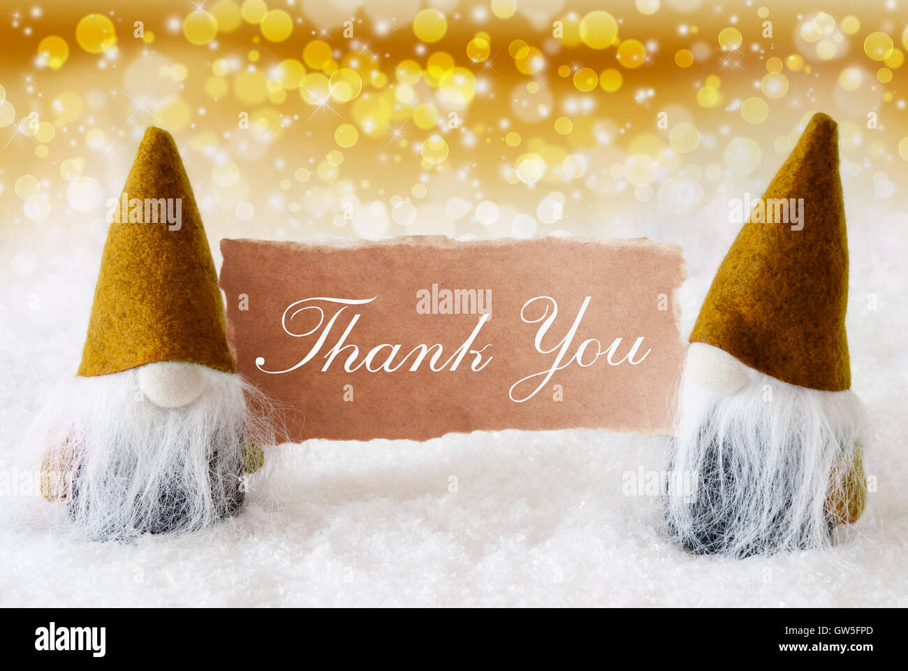 Golden Noble Gnomes With Card, Text Thank You Stock Photo - Alamy