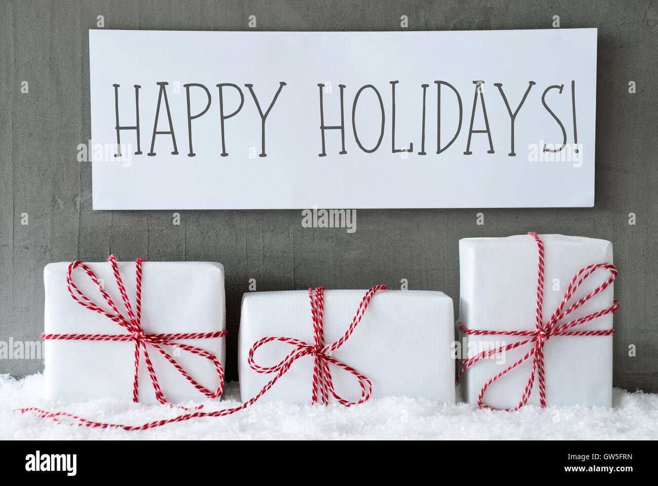 Happy holidays text on gift hi-res stock photography and images - Alamy