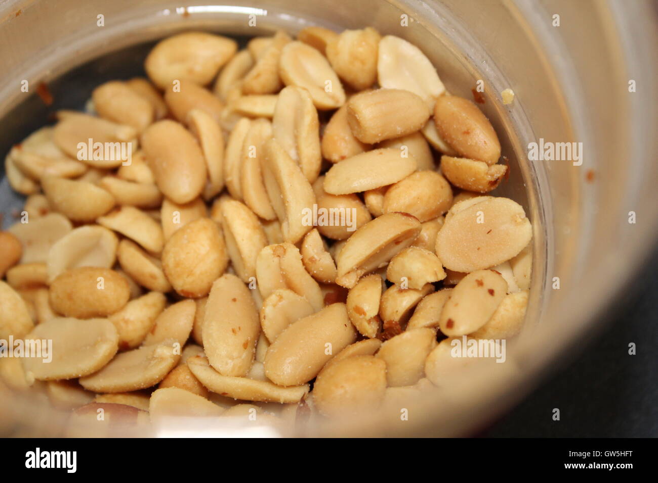 Simply a picture of dry roasted peanuts Stock Photo - Alamy