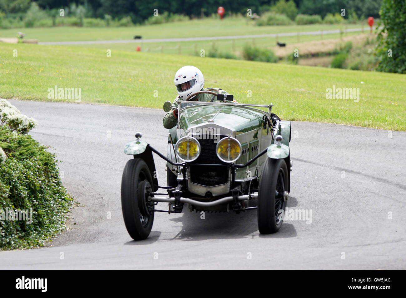 Chris Batty powers his 1930 Frazer Nash Bugatti into the roundabout at ...