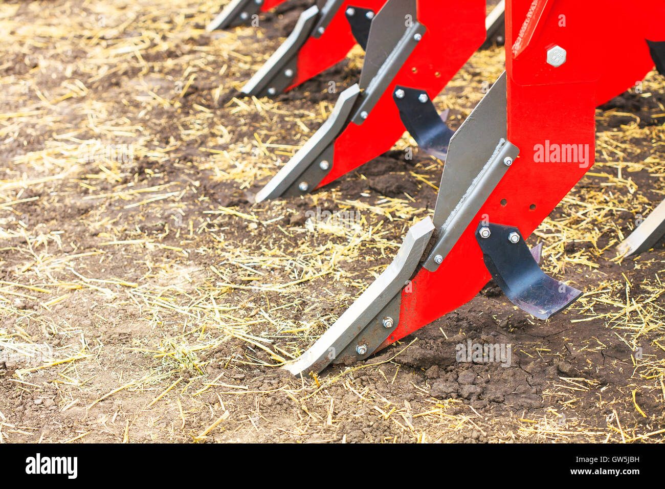 Plough close-up on the ground, farm equipment Stock Photo - Alamy