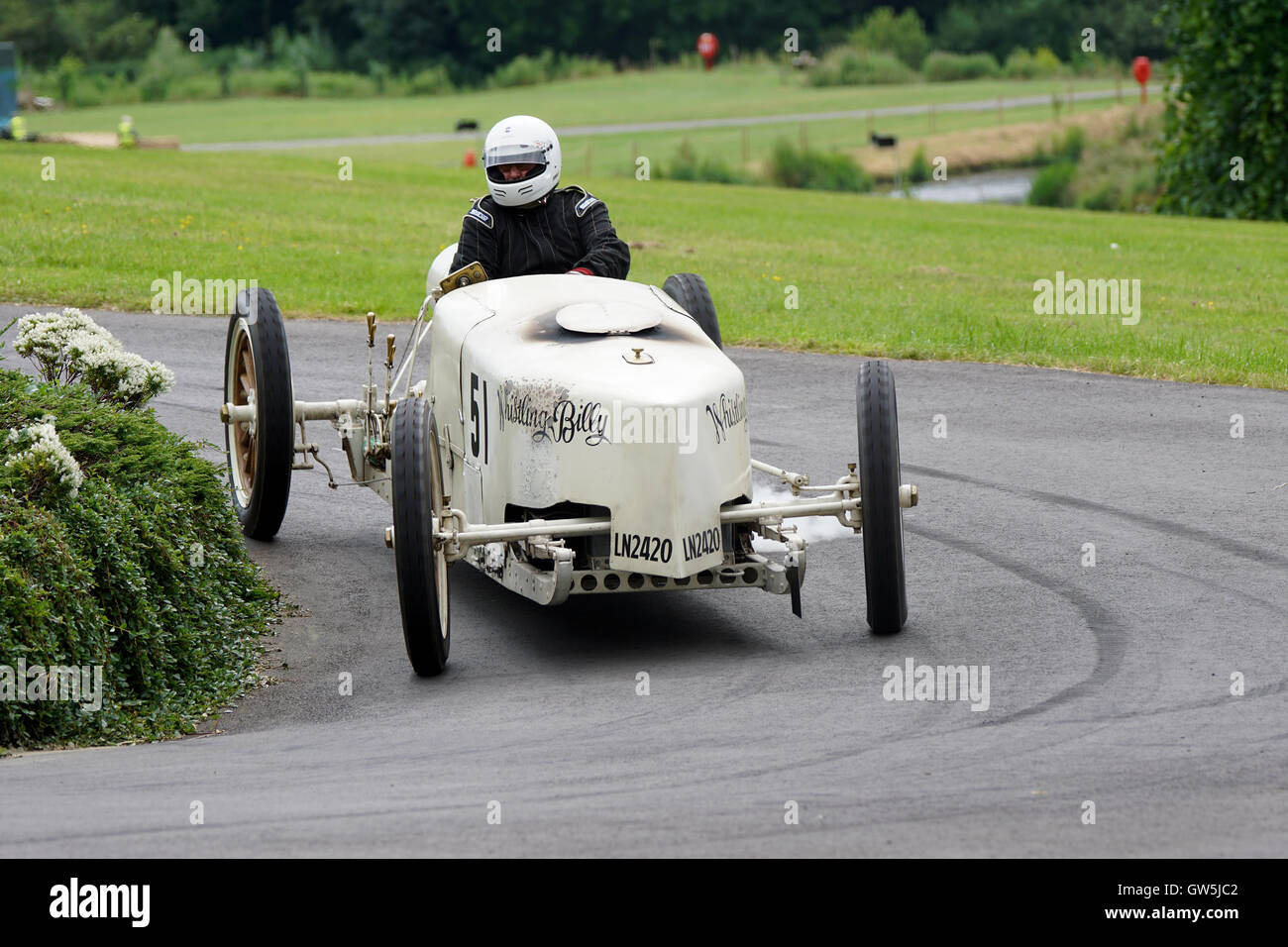 Dr Robert Dyke steers his 1905 White Racing Steam Car Whistling Billy ...