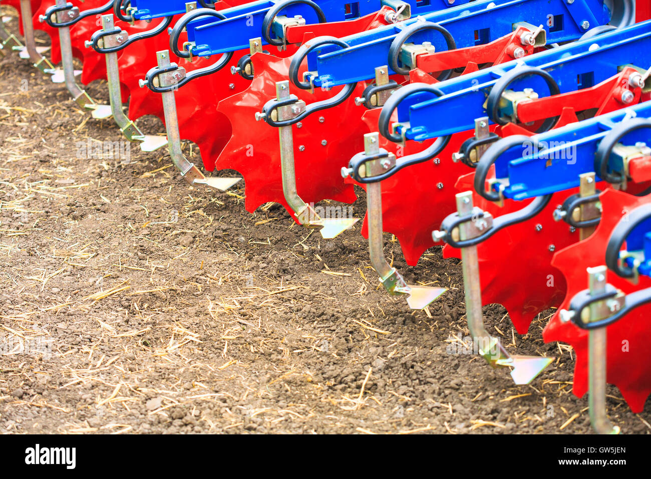 Agricultural harrow close-up on the ground, farm equipment Stock Photo ...