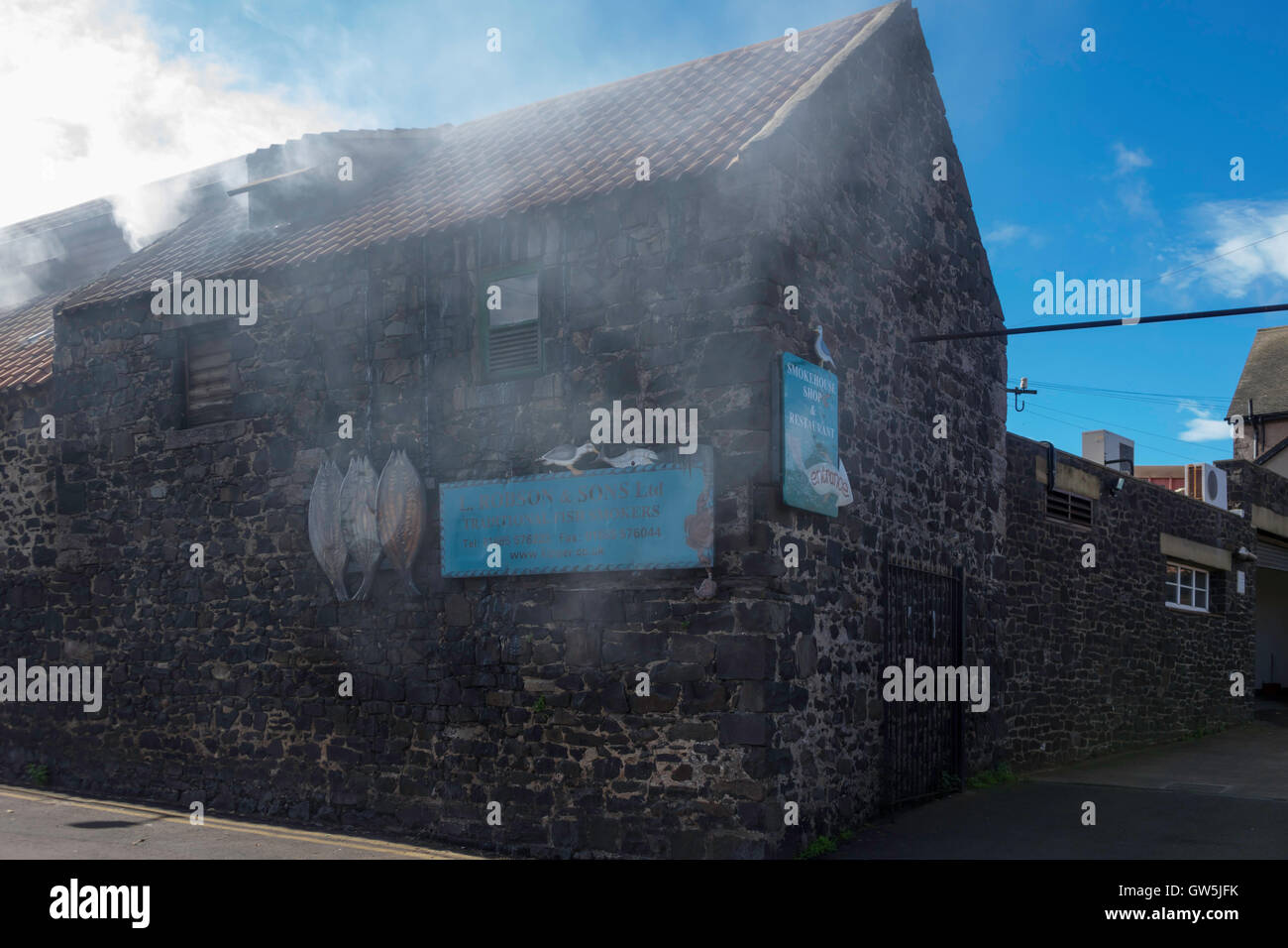 Smoke billowing from the traditional fish smoke house of L. Dobson and ...
