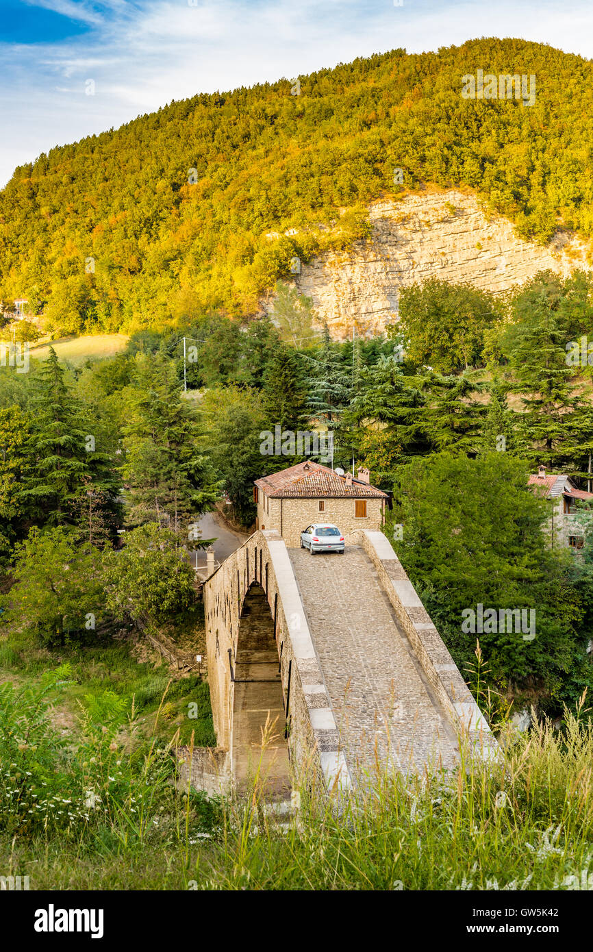car crossing ancient hunchback bridge in Emilia Romagna Stock Photo - Alamy
